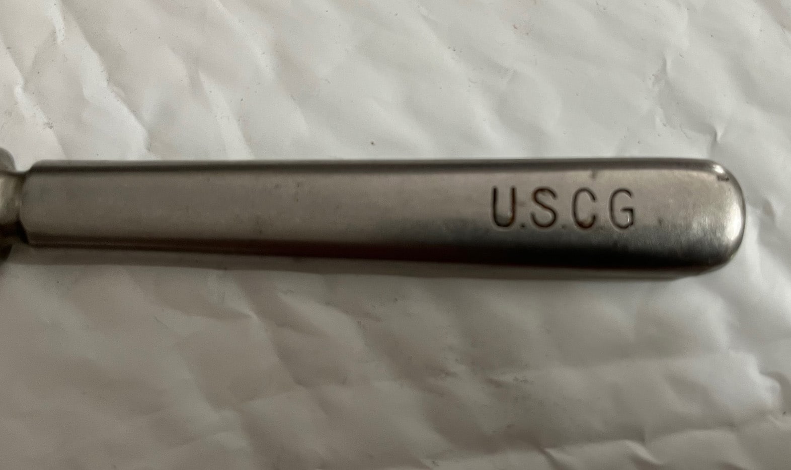 21371. U.S. Coast Guard silver plate flatware marked with “U.S.C.G. and ...