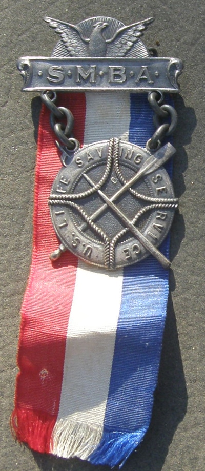 22414g. [pin/ribbon] U. S. Life-Saving Service Surfman’s Mutual Benefit ...